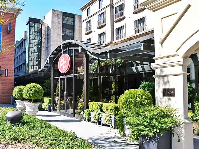 That red circular sign is your beacon to botanical bliss, where flowers meet fine dining in downtown Atlanta.