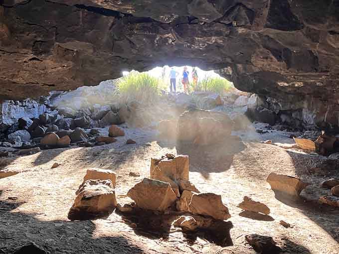 That moment when sunlight streams through ancient volcanic rock feels like nature's own cathedral welcoming you home.