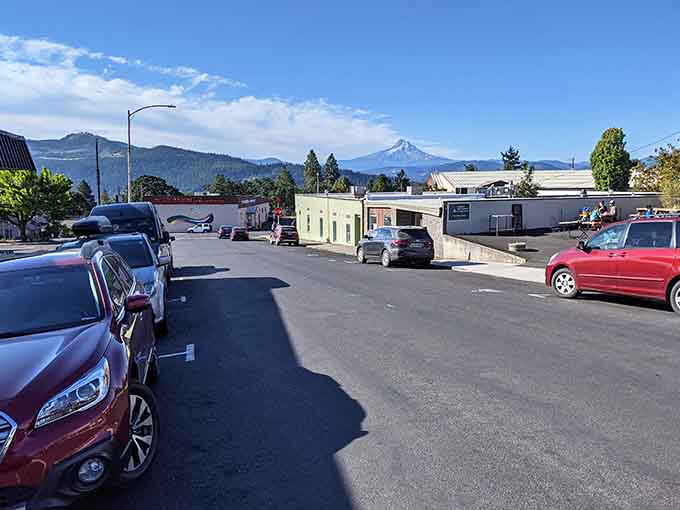 Mount Hood photobombs your parking lot view because apparently one volcanic peak wasn't showing off enough already.