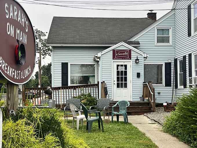 That charming round sign and cozy outdoor seating whisper "breakfast paradise" louder than any billboard ever could.