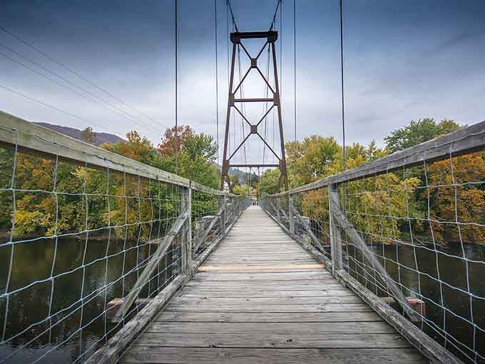 The Historic Buchanan Swinging Bridge stretches across the James River like nature's own tightrope act.