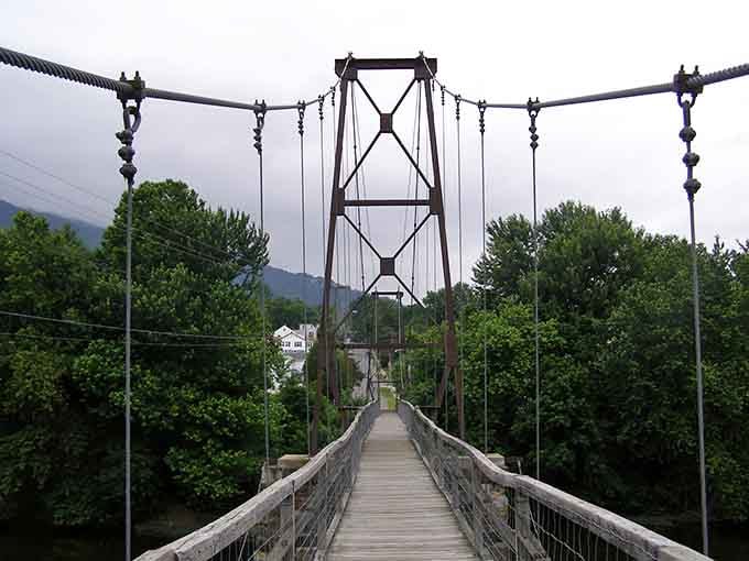 The Historic Buchanan Swinging Bridge stretches across the James River like nature's own tightrope act.