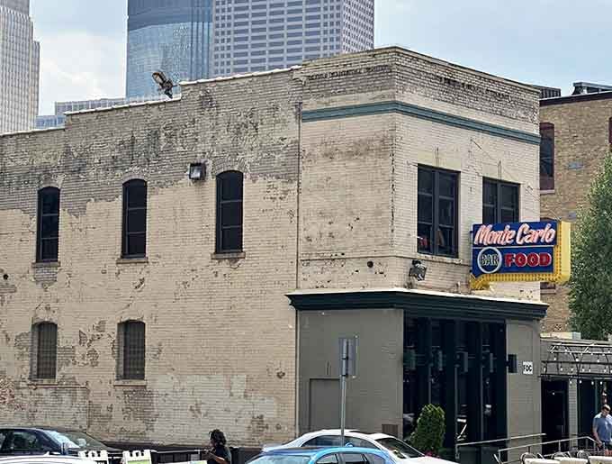 Classic brick meets modern skyline, proving timeless supper clubs belong in the city just as much as anywhere else.