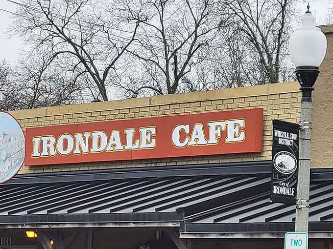 Even on a gray day, that iconic Irondale Cafe sign shines bright, beckoning you toward some seriously good Southern cooking.
