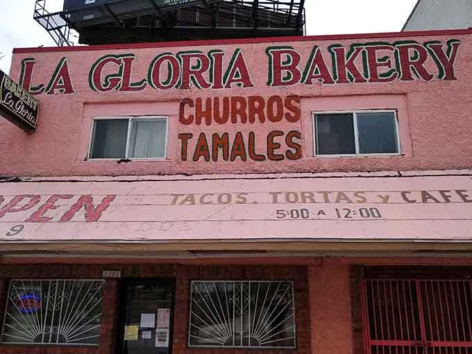 That pink building isn't shy, and neither are the tamales waiting inside for you.