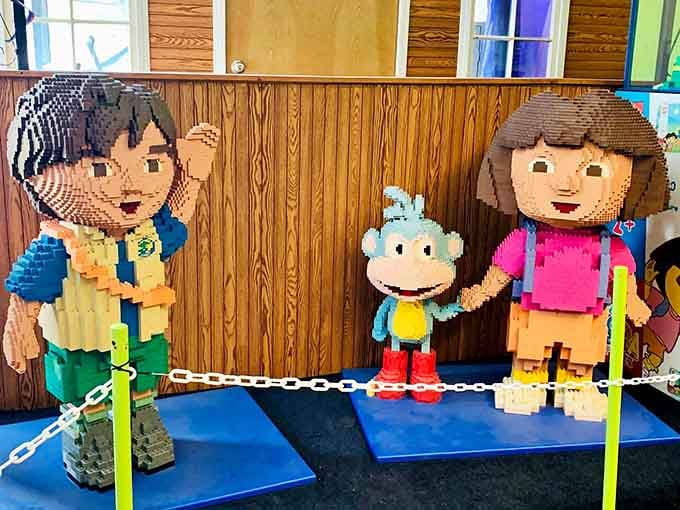 These beloved childhood characters stand life-sized and ready for exploration, backpack included and adventure awaiting.