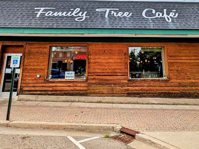 That wood-paneled exterior might look humble, but inside awaits breakfast magic worth bragging about to your neighbors.