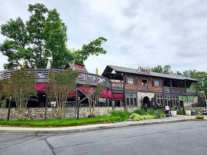 Stone, wood, and greenery combine to create a building that feels both substantial and welcoming at once.