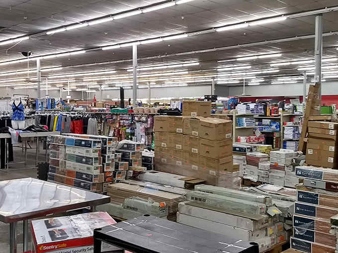 Inside The Liquidators, where organized chaos meets bargain hunter's paradise in one glorious warehouse sprawl.