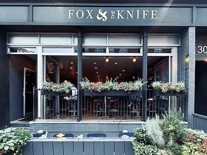 The storefront gleams with understated elegance, proving that great Italian food doesn't need gondolas painted on the windows.