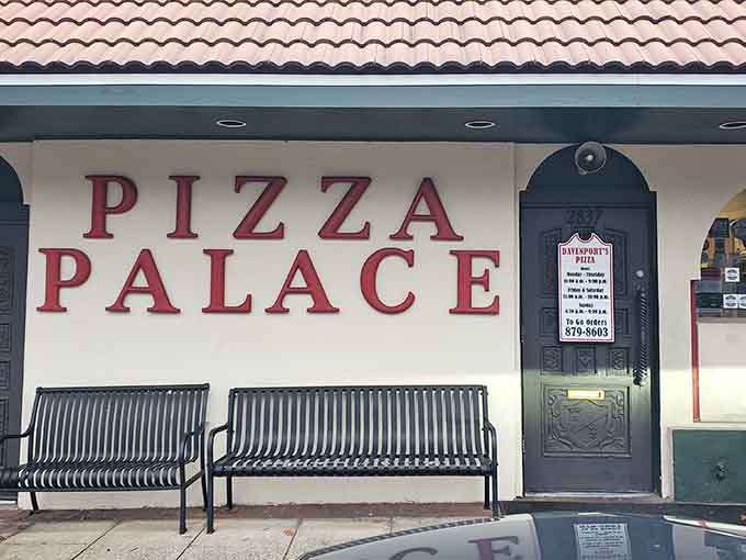 Those benches outside aren't just for show; they're where anticipation builds before pizza paradise begins.