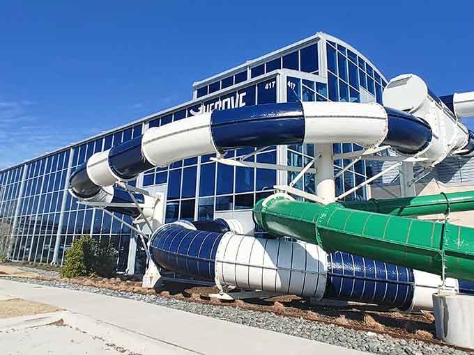 Those slides bursting out of the building like they couldn't wait to get the party started outside too.