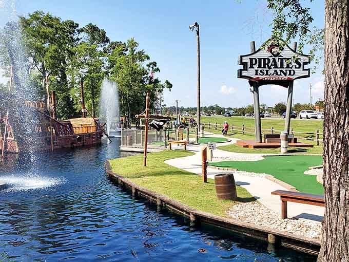 That pirate ship and fountain combo proves someone understood the assignment when designing this tropical mini golf paradise.