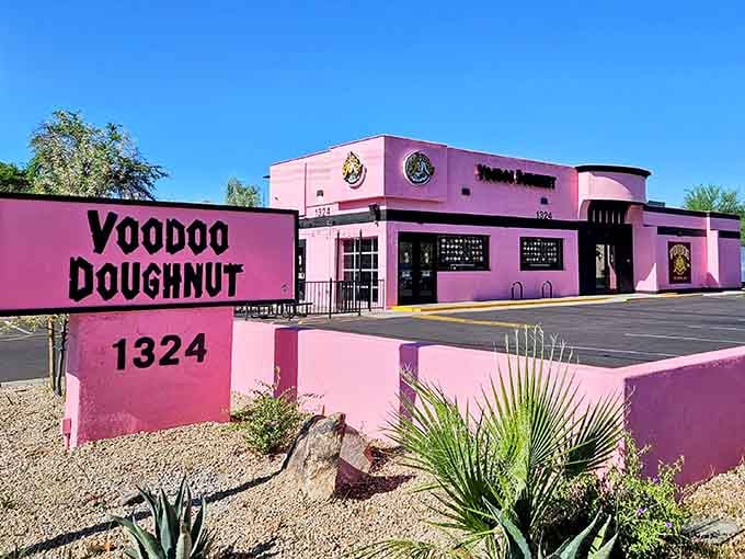 That pink exterior isn't whispering&mdash;it's shouting that something wonderfully weird is happening inside those walls.