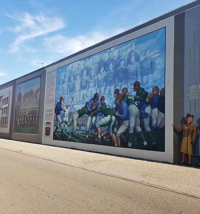 Nearly 2,000 feet of storytelling stretches along Portsmouth's riverfront, turning flood protection into fine art.
