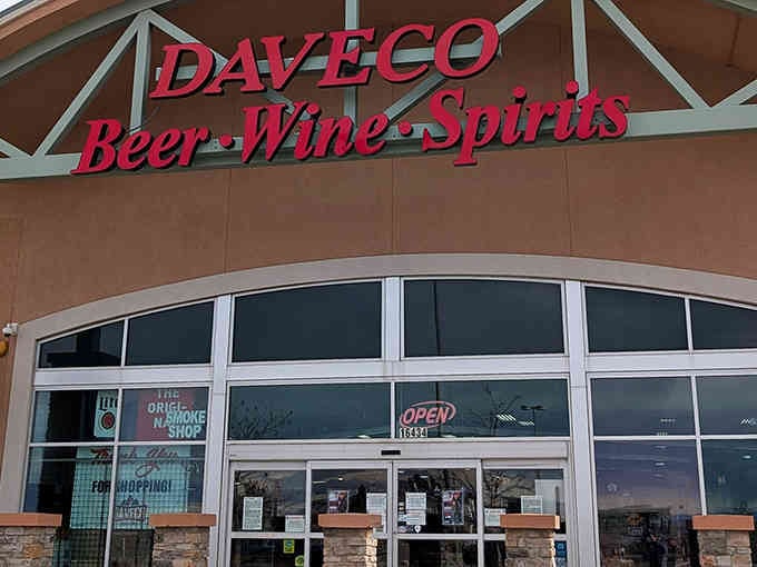 That distinctive arched entrance isn't just architecture, it's a beacon calling you toward beverage paradise in Thornton.