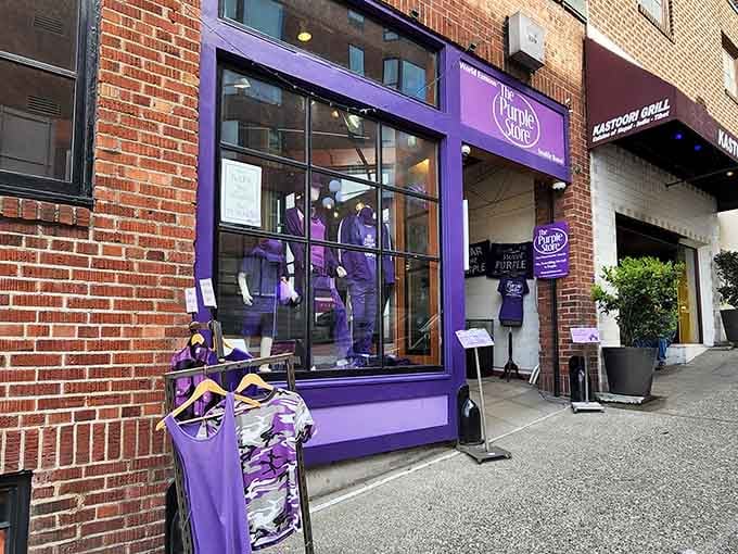 That storefront commitment is real: purple trim, purple displays, and enough violet vibes to make Prince smile knowingly.