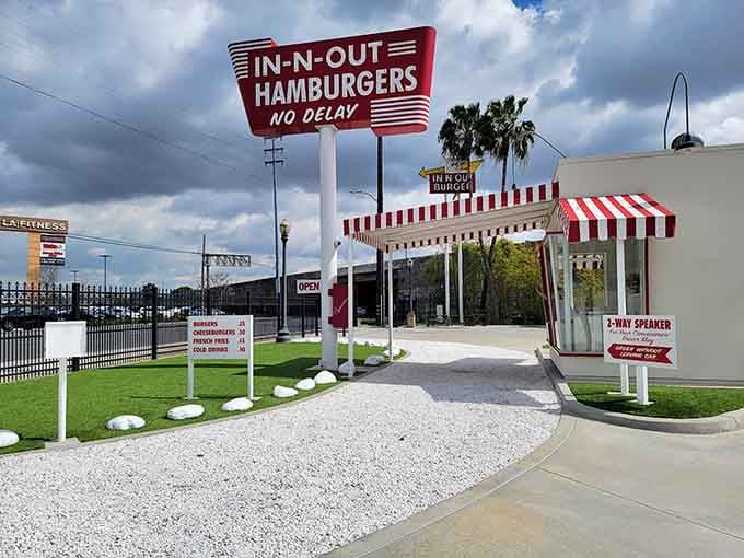 That iconic red and white striped awning beckons like a siren song to burger lovers everywhere.
