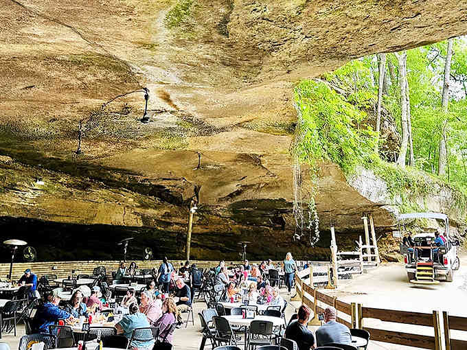 Mother Nature's dining room seats about a hundred guests under striations of limestone that predate your great-great-grandparents by millions of years.