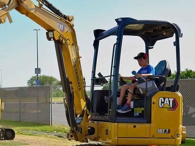 That's not a toy excavator&mdash;it's the real deal, complete with hydraulic power and childhood dreams coming true.