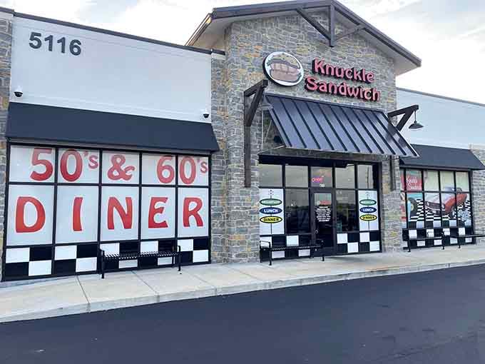 That checkered trim and bold signage promise exactly what's inside: pure retro diner magic and seriously good sandwiches.