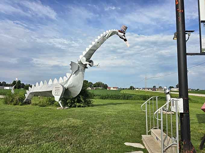 Meet the 35-foot guardian of the prairie, complete with Uncle Sam hat and serious fire-breathing credentials.