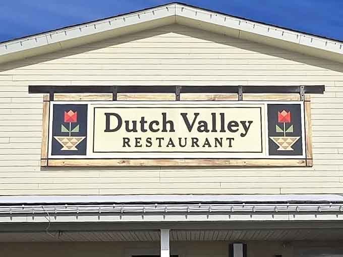 That classic sign flanked by tulip motifs promises the kind of breakfast that'll make you forget your diet exists.