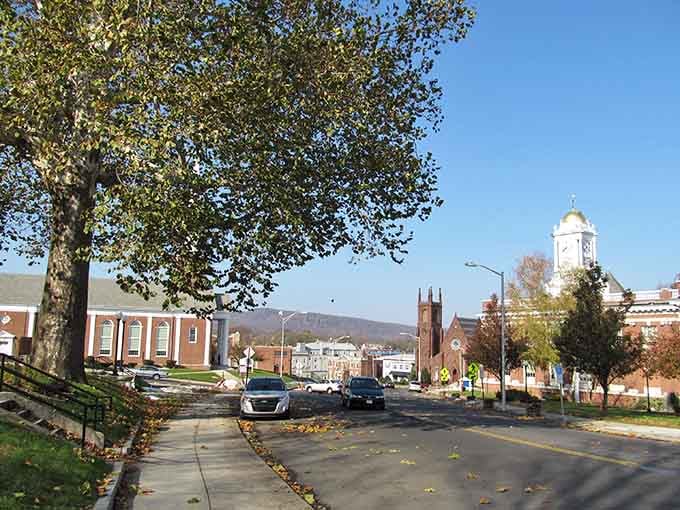 Tree-lined streets and classic architecture remind you why Connecticut towns have that timeless New England charm.
