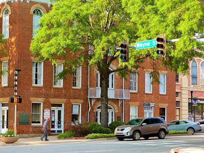 Classic brick buildings and tree-lined streets create the kind of downtown where parking is easy and stress is basically nonexistent.