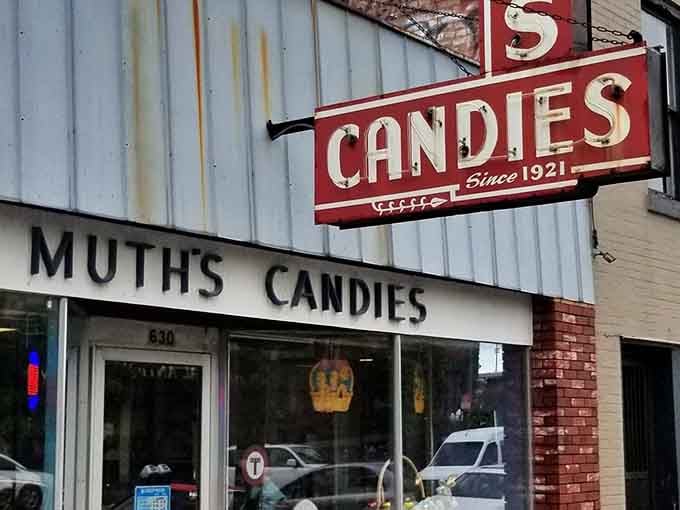 That vintage storefront isn't trying to look retro – it earned every year of that weathered charm naturally.