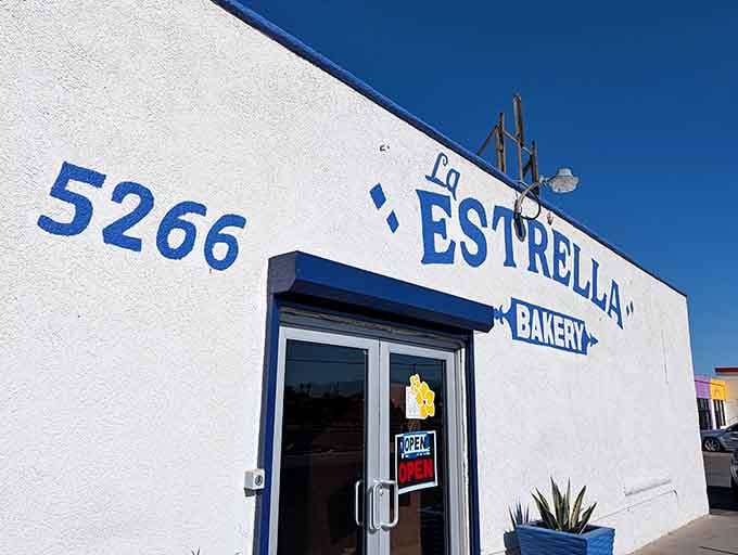 That cheerful blue and white exterior is your beacon to tamale paradise in the heart of Tucson.