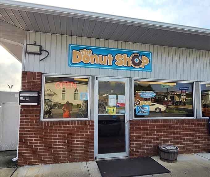That cheerful blue sign isn't lying to you, this is exactly where donut dreams come true every morning.