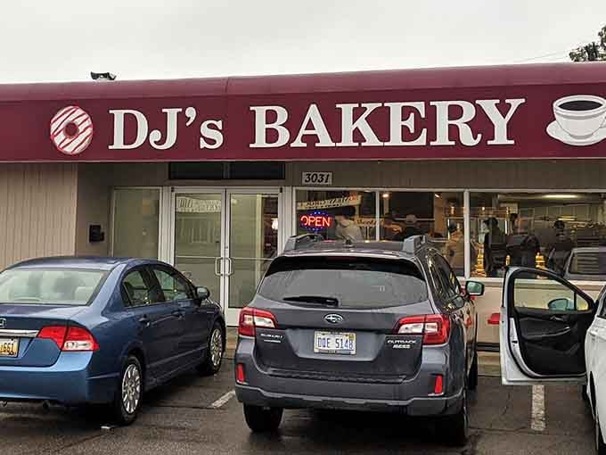 The "OPEN" sign glowing in the window is basically the Bat-Signal for anyone who appreciates a proper donut.