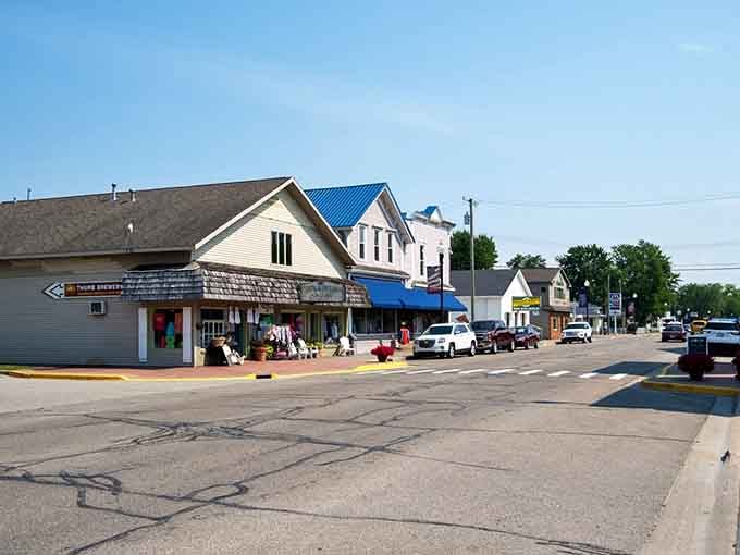 Main Street Caseville stretches out like a postcard from a simpler time, complete with that iconic lighthouse beckoning.