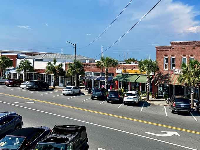 Palm trees and brick buildings create that perfect Old Florida vibe where every storefront invites exploration and discovery.