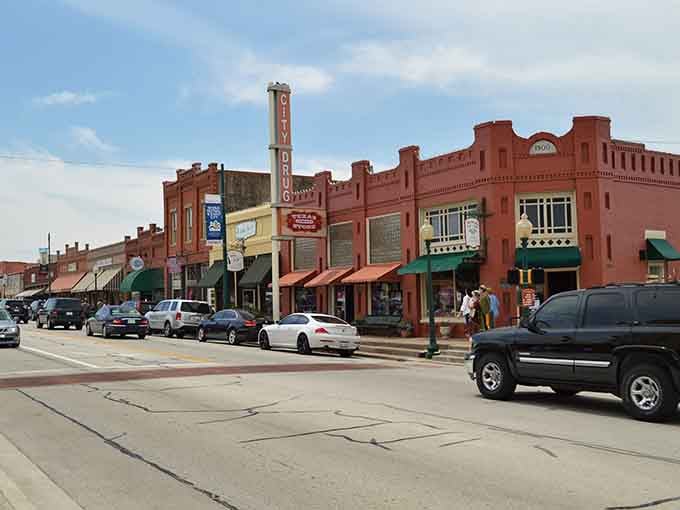 Red brick facades and vintage storefronts line up like they're auditioning for America's most photogenic downtown street scene.