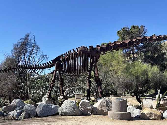 That's not a lawn ornament—that's a full-scale dinosaur reminding you why SUVs seem suddenly adorable.