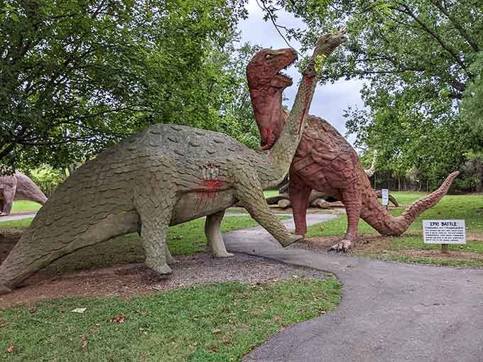Two dinosaurs locked in eternal combat, frozen mid-battle like the world's most ambitious lawn ornament collection.
