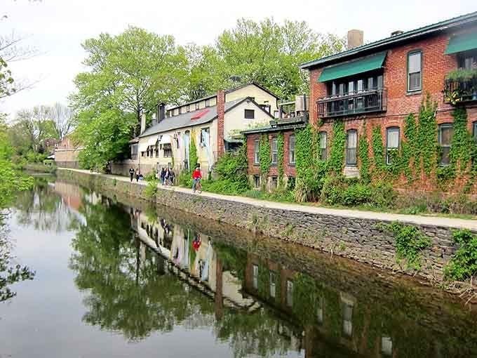 Those ivy-covered brick buildings reflected in the canal water create a scene so perfect it almost seems staged.