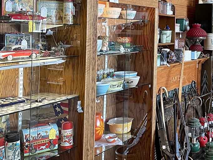 Every shelf tells a story here, from vintage lunch boxes to old farm tools that actually built America.