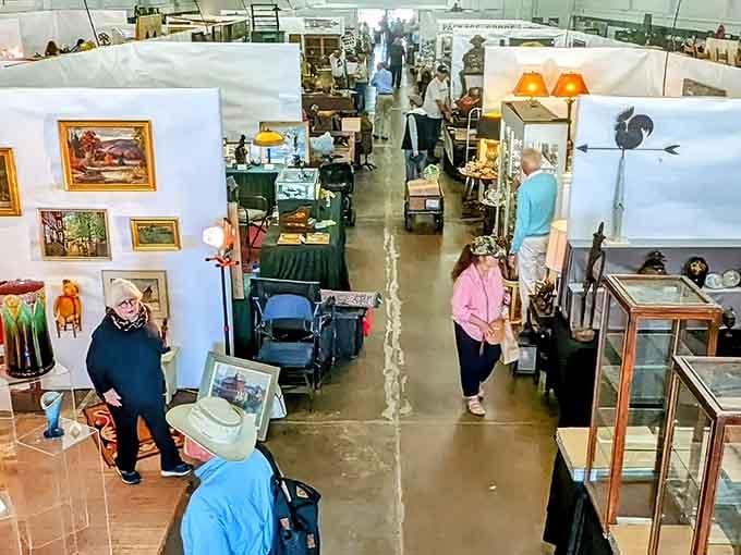 From above, the treasure hunt unfolds in organized chaos, where every aisle promises discoveries your living room desperately needs.