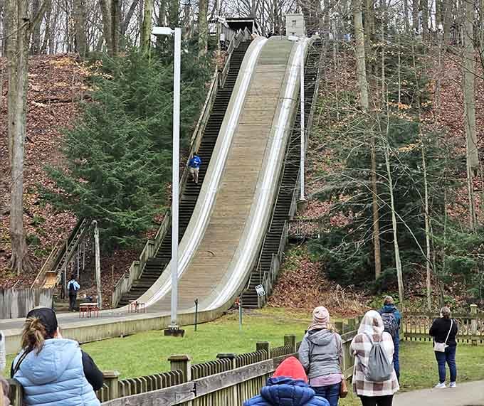 That moment when you're standing at the bottom, watching others climb those stairs, and realizing you'll be making that trek after every single run.