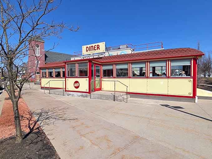 That red and cream exterior isn't just architecture &ndash; it's a time machine disguised as breakfast headquarters.