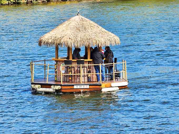Nothing says "Pittsburgh" quite like a thatched roof floating past skyscrapers and convention centers on a Tuesday afternoon.