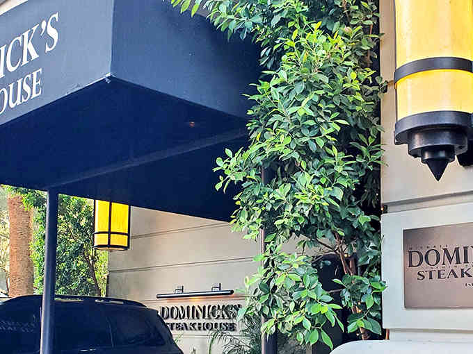 That exterior greenery isn't just decoration; it's nature's way of saying "something special happens behind these doors."