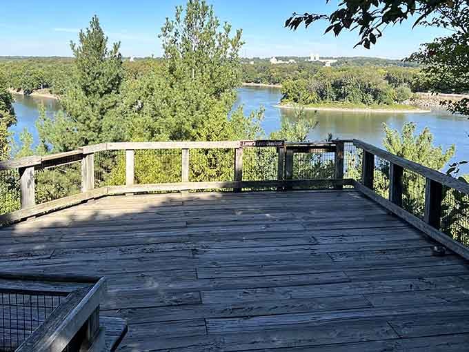 That wooden platform jutting over the Illinois River is your front-row seat to nature's greatest show.