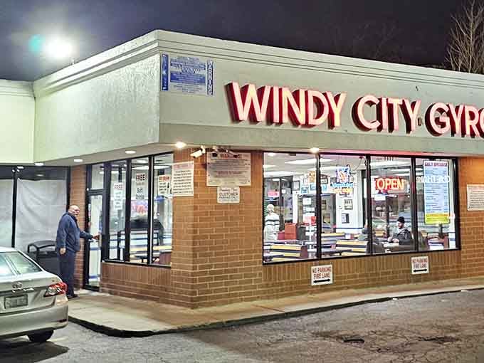 That glowing red sign isn't just calling your name, it's practically singing a siren song of gyro goodness.