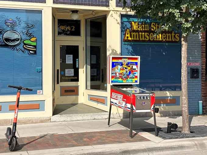 The storefront beckons with vintage charm, promising an escape from the modern world just beyond those doors.