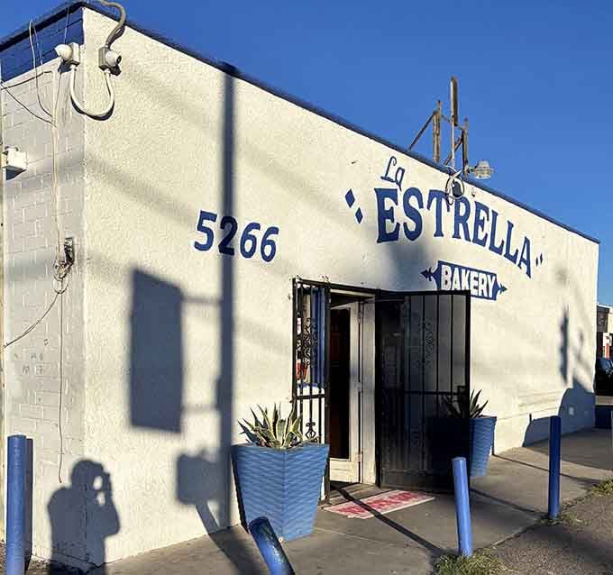 That cheerful blue and white exterior is your beacon to tamale paradise in the heart of Tucson.