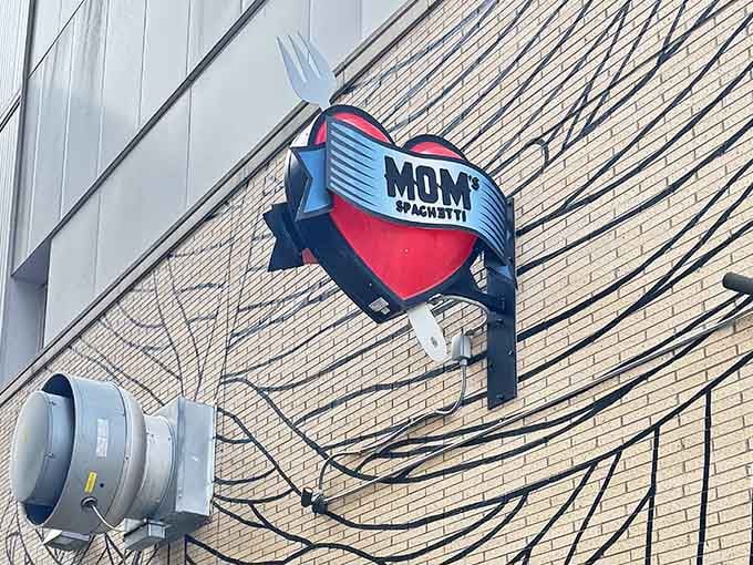 That iconic sign beckons like a beacon of carb-loaded happiness in downtown Detroit's urban landscape.